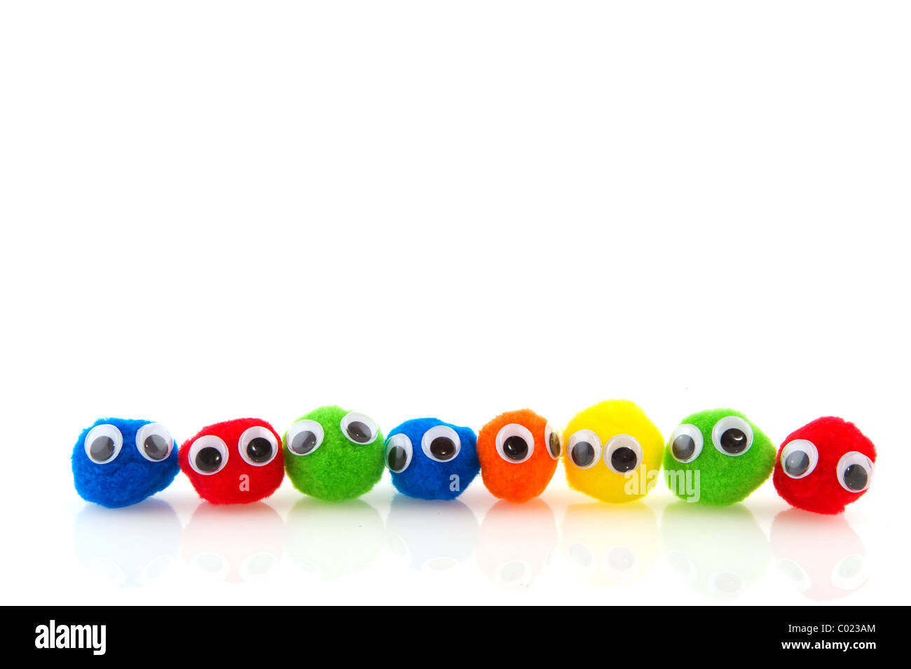 Curious balls in different colors isolated over white background Stock ...