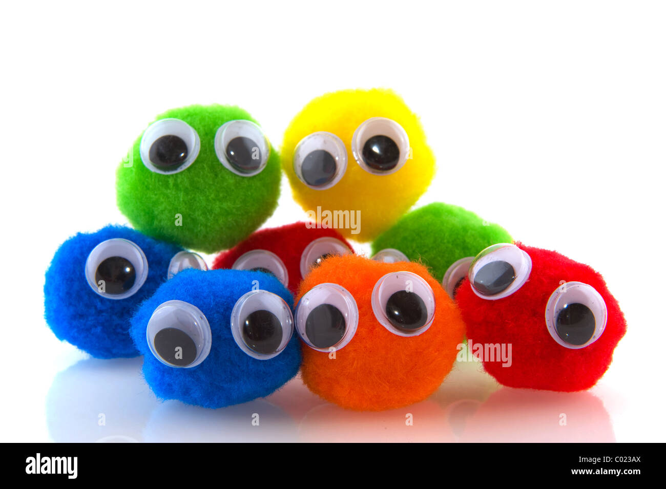 Curious balls in different colors isolated over white background Stock ...
