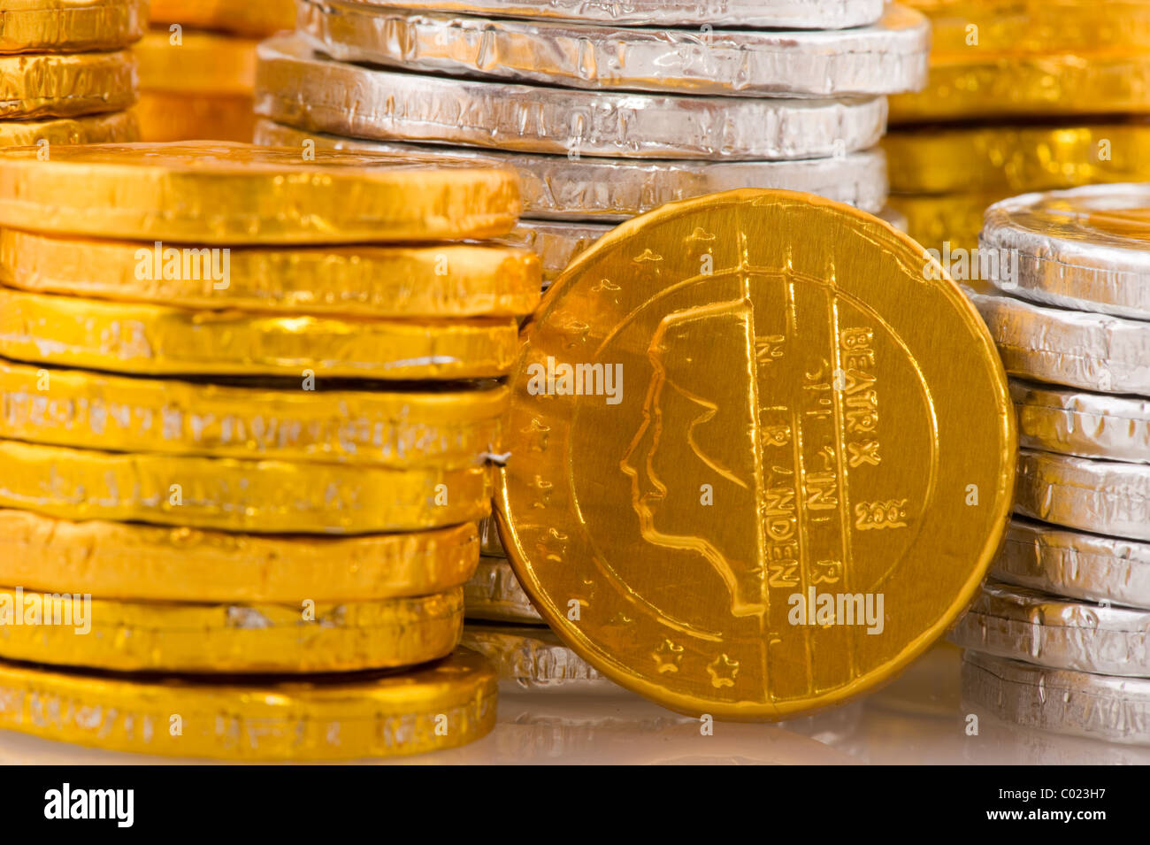 Lots of chocolate Dutch Euro money in silver and copper Stock Photo - Alamy