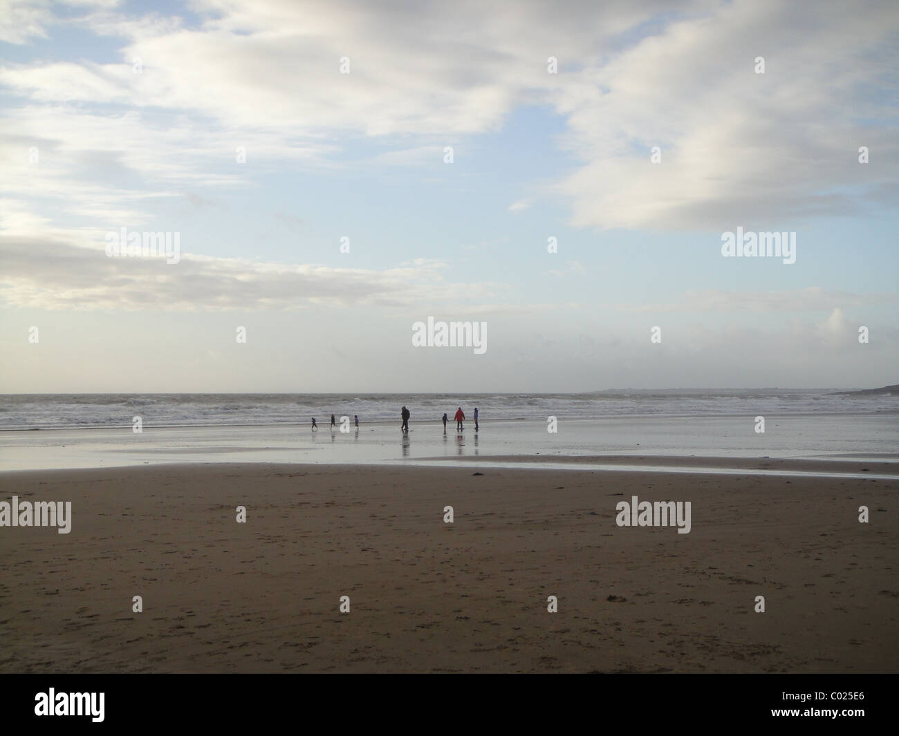 Clouds over rural beach scene in Wales Stock Photo - Alamy