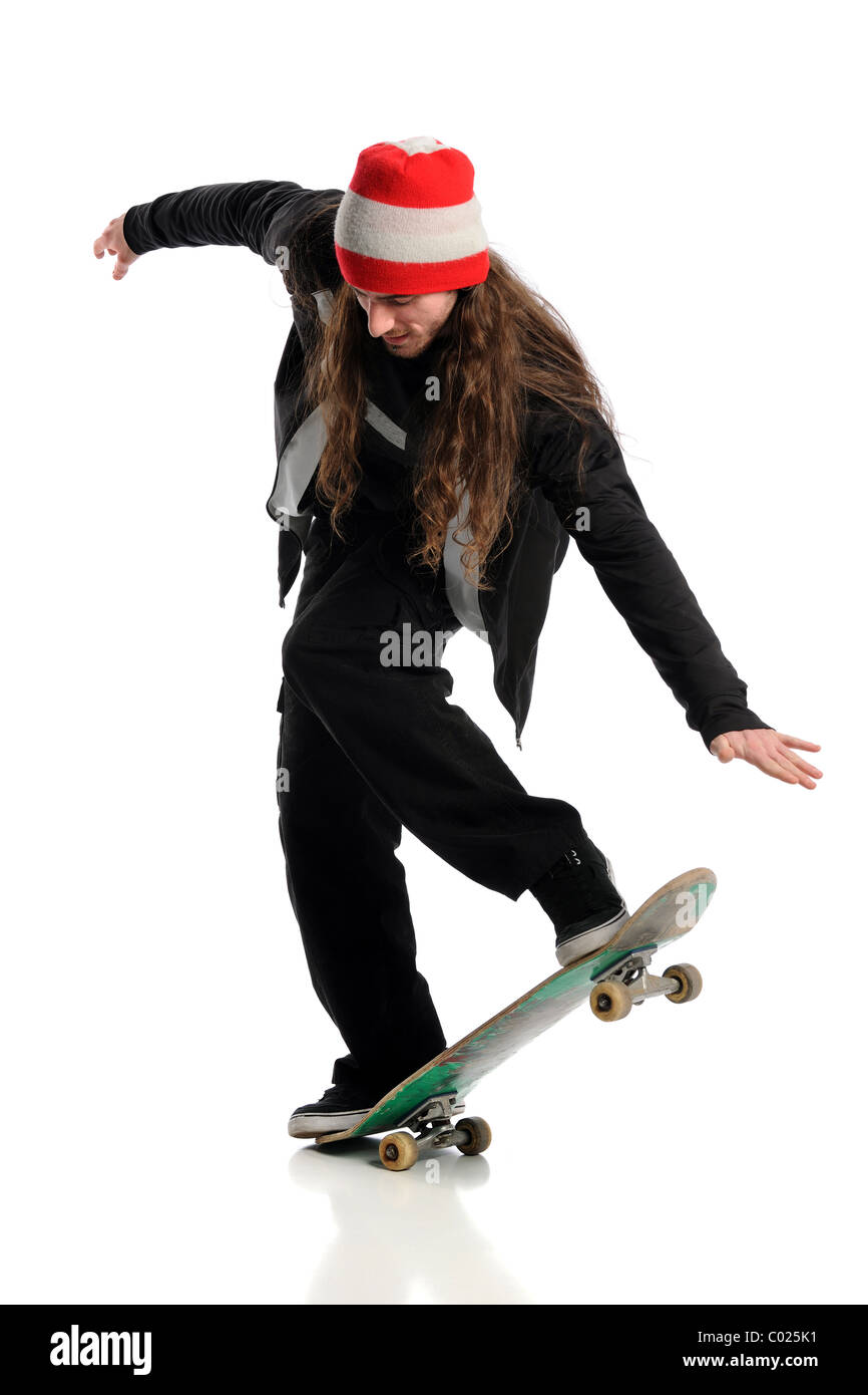 Young skateboarder in action isolated over white background Stock Photo ...