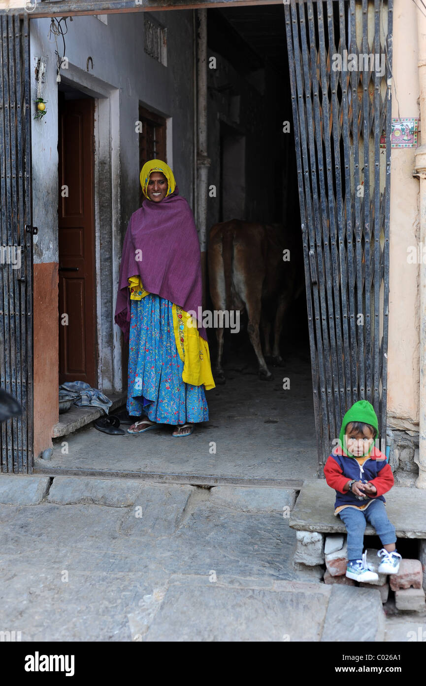 Mother watches over child Stock Photo - Alamy