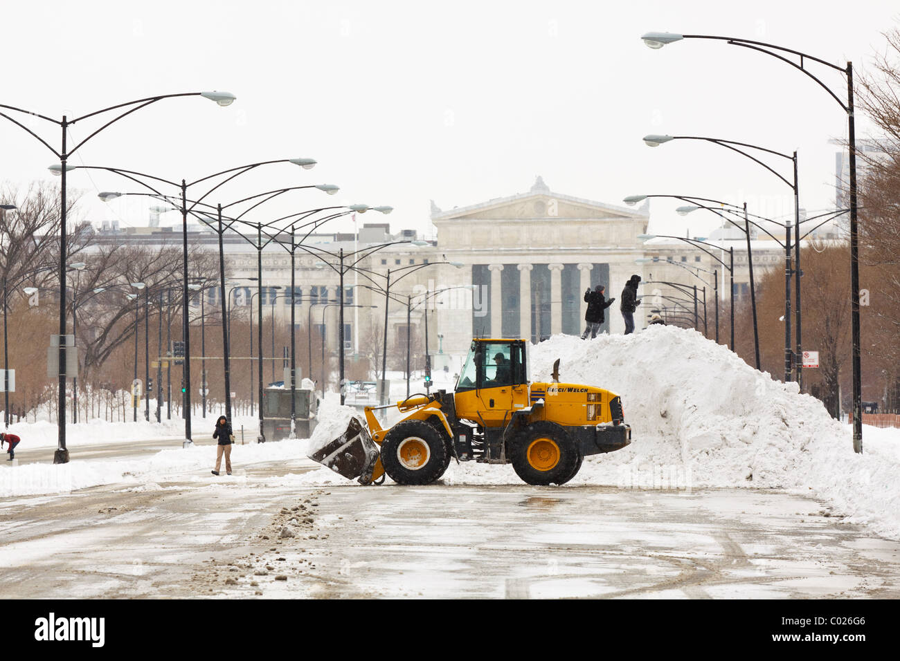 Caterpillar tractor cleaning up snow on Lake Shore Drive after the 2011 ...