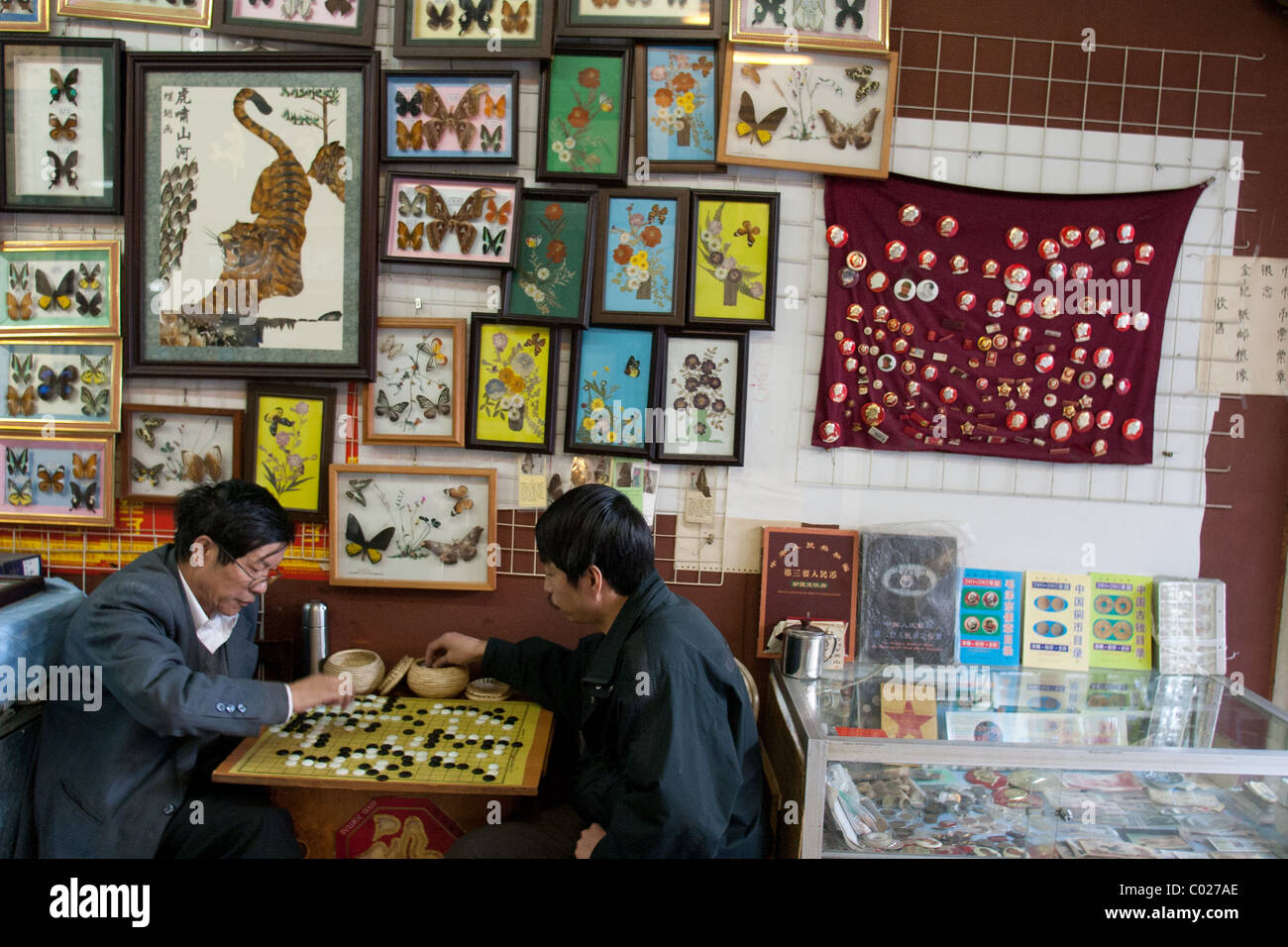 Chairman Mao memorabilia in small shops, in Kunming, Yunnan province ...
