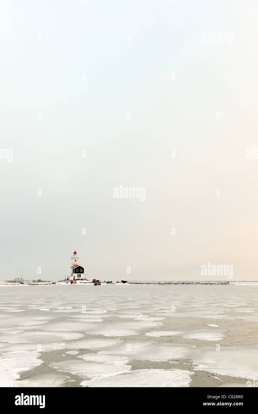 Dutch winter landscape with frozen sea and lighthouse Stock Photo - Alamy