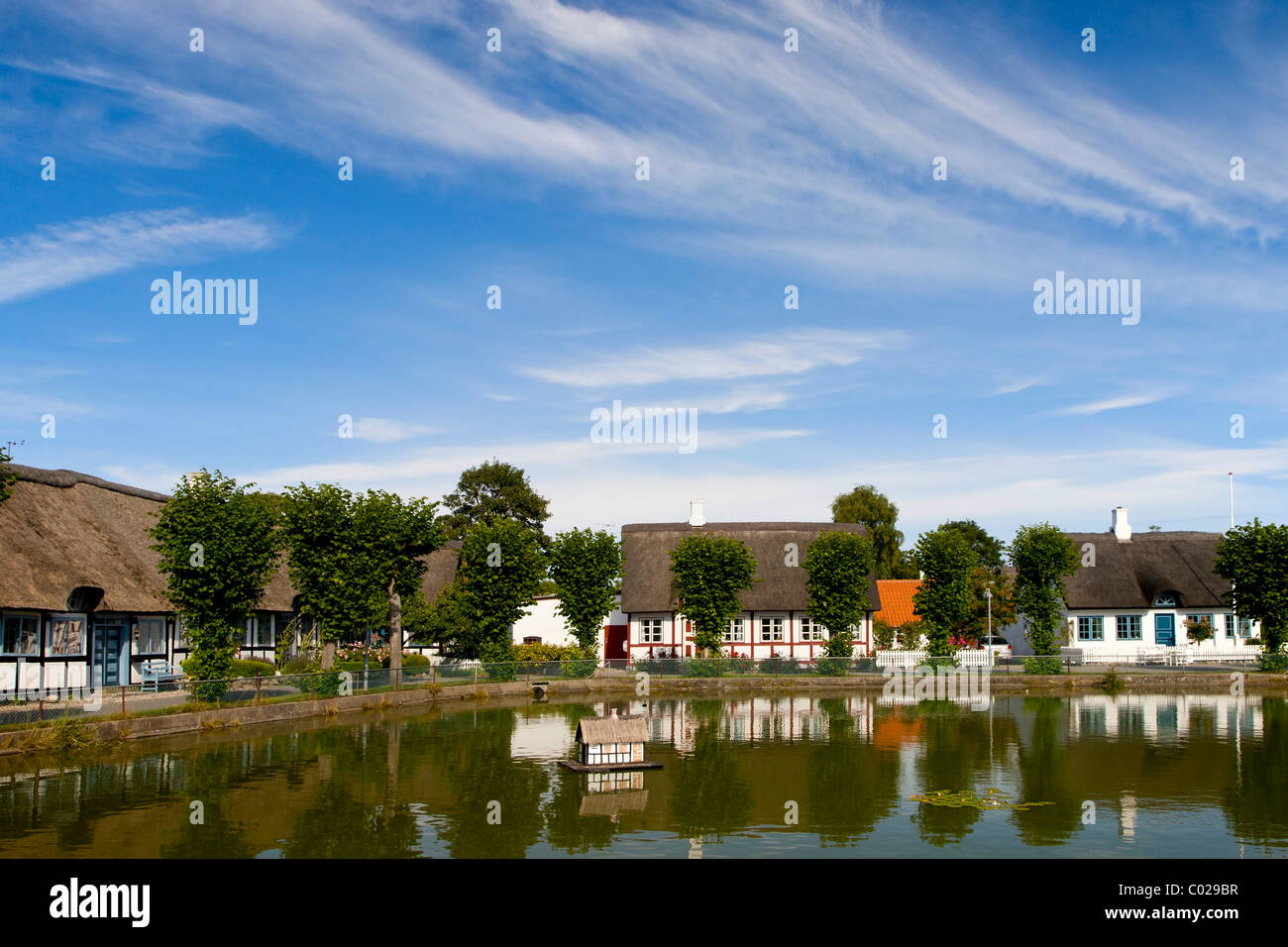 The idyllic area around the village pond, Nordby, Samsoe, Denmark ...