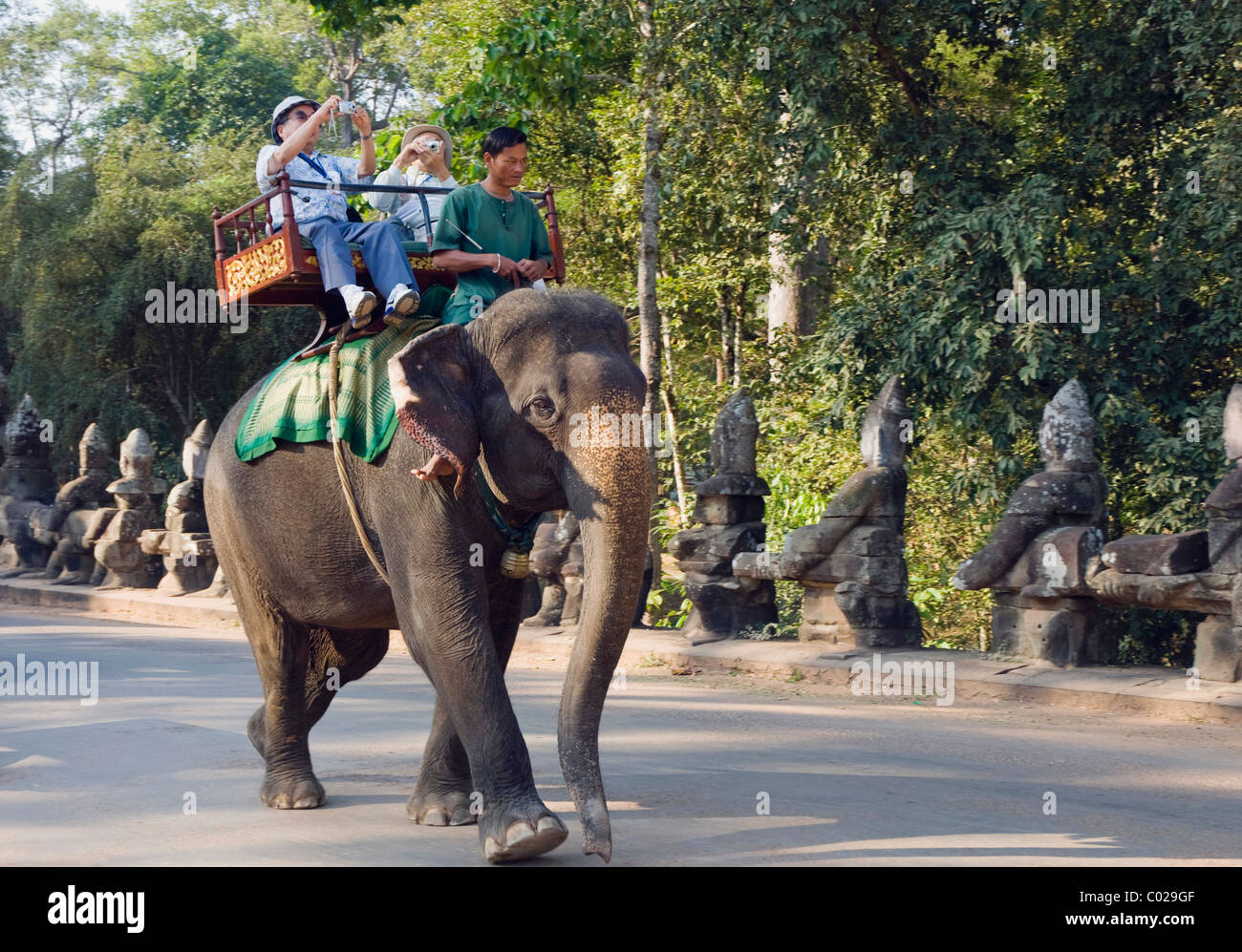 Riding on an elephant hi-res stock photography and images - Alamy