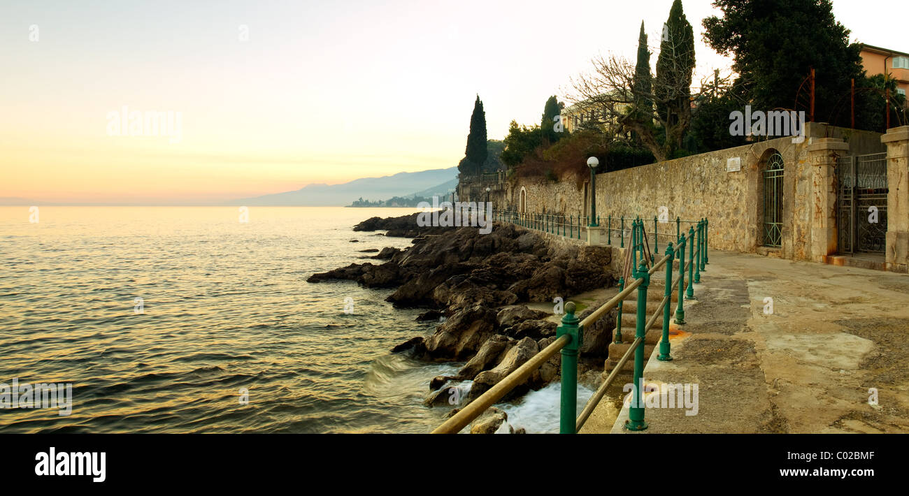 Walkway along the Adriatic coast near a town called Volosko in Croatia ...