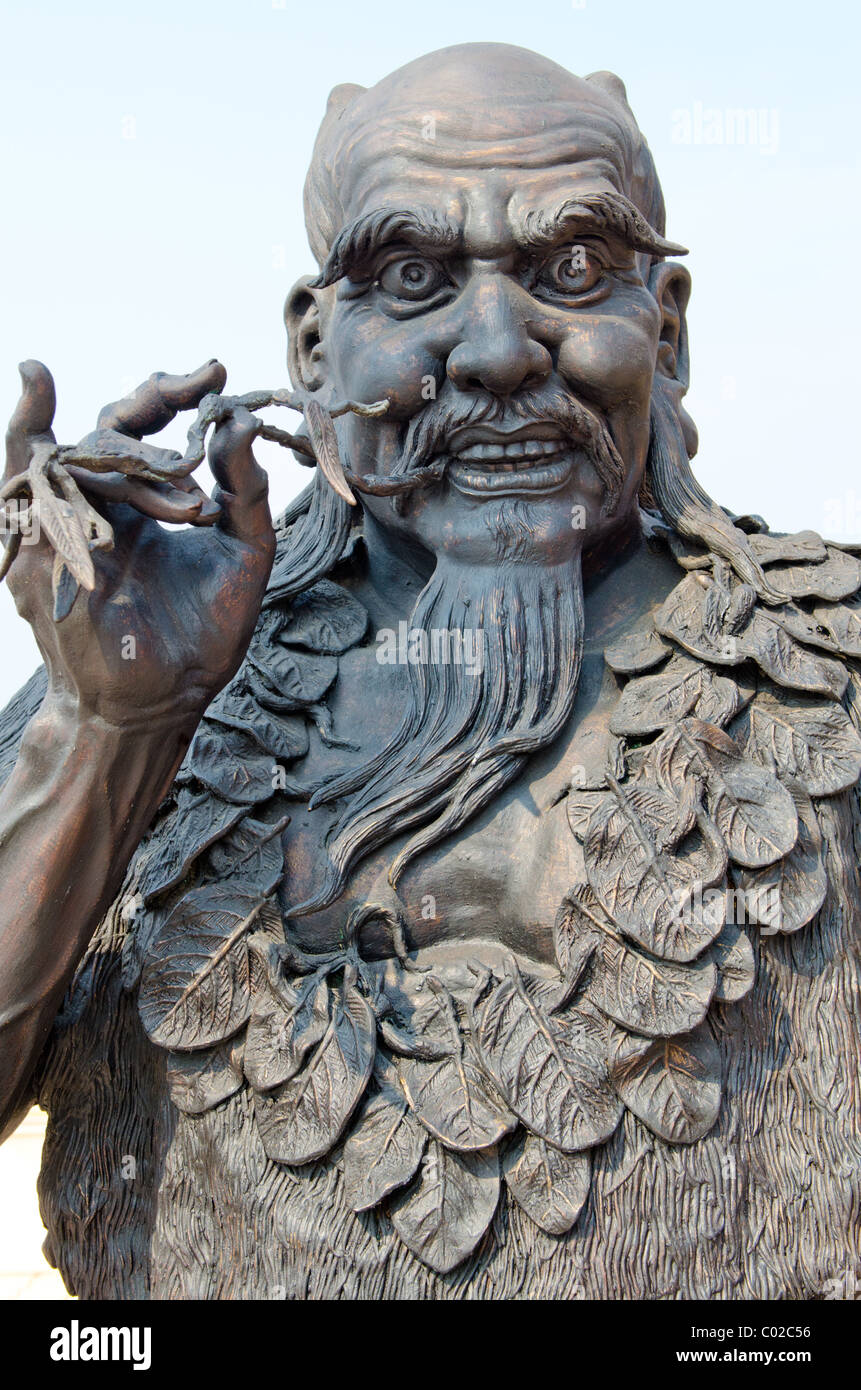 Stone temple figure Stock Photo - Alamy