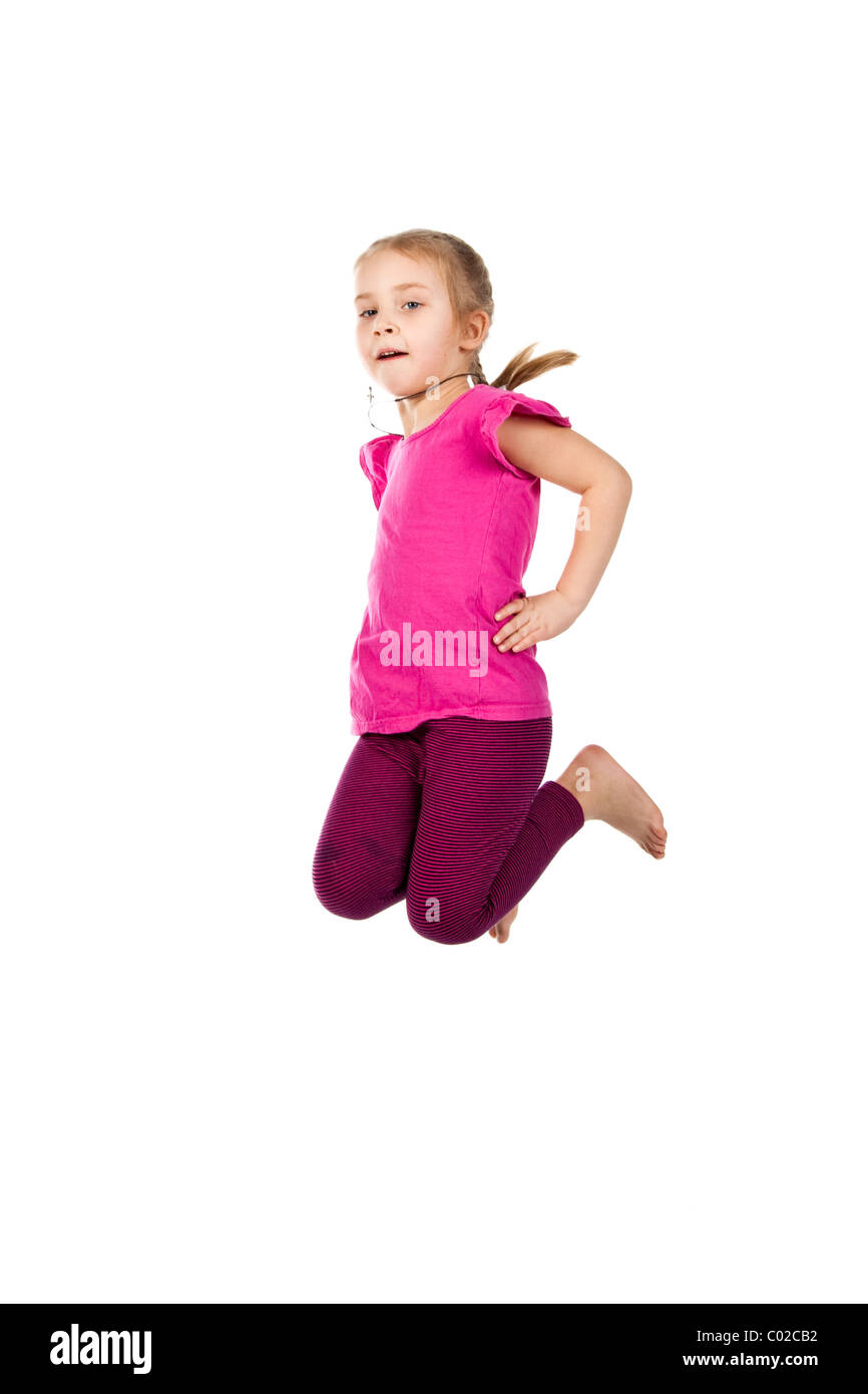 Beautiful girl jumping high isolated on white Stock Photo - Alamy
