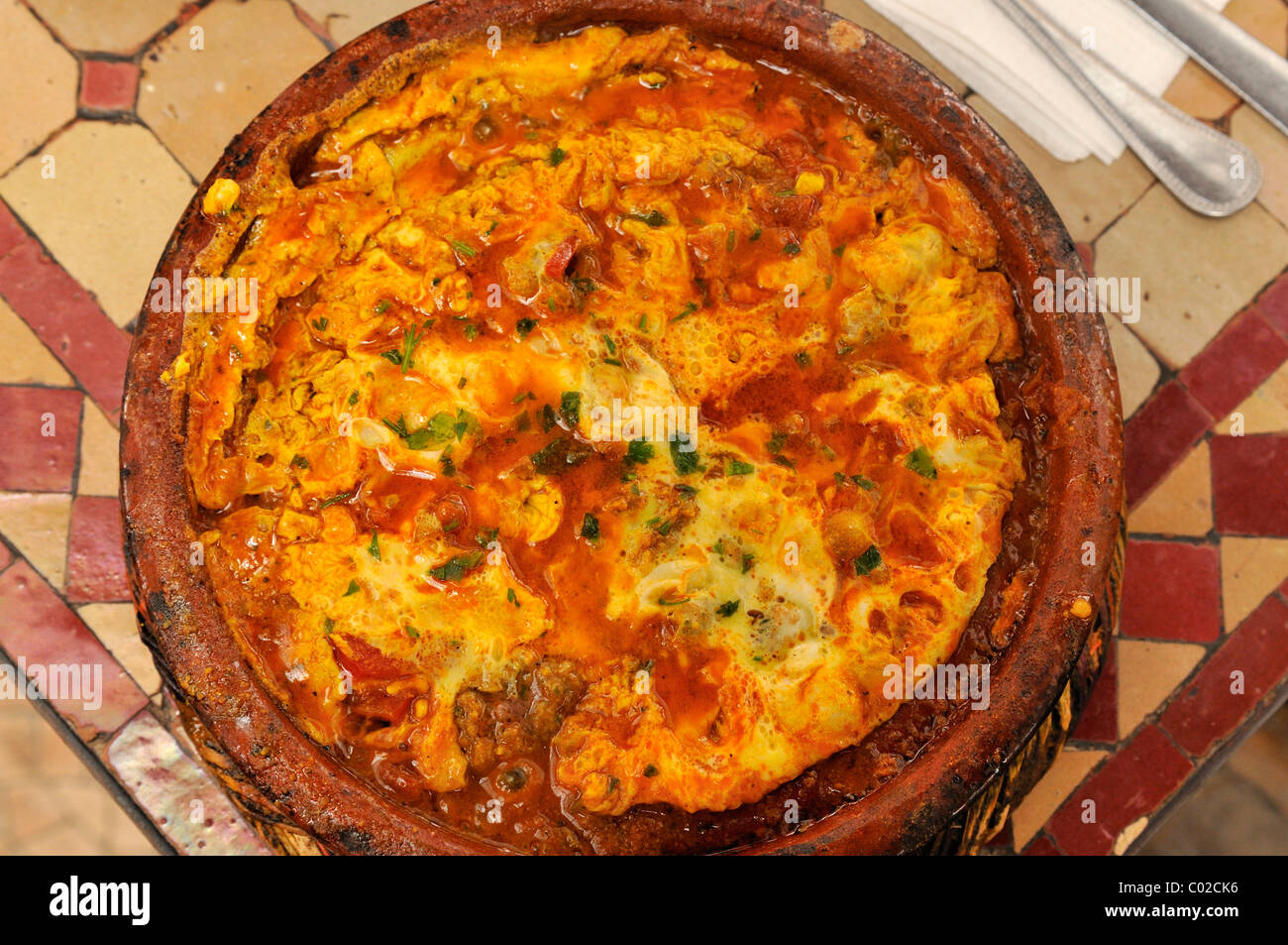 Traditional tajine or tagine dish with meatballs and egg, Morocco ...