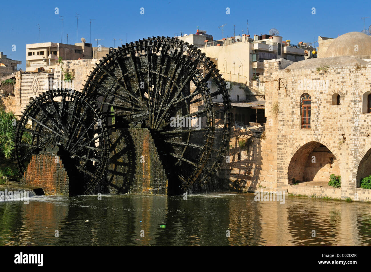 Noria waterwheel on the Orontes River and Nuri, Nouri Mosque in Hama ...