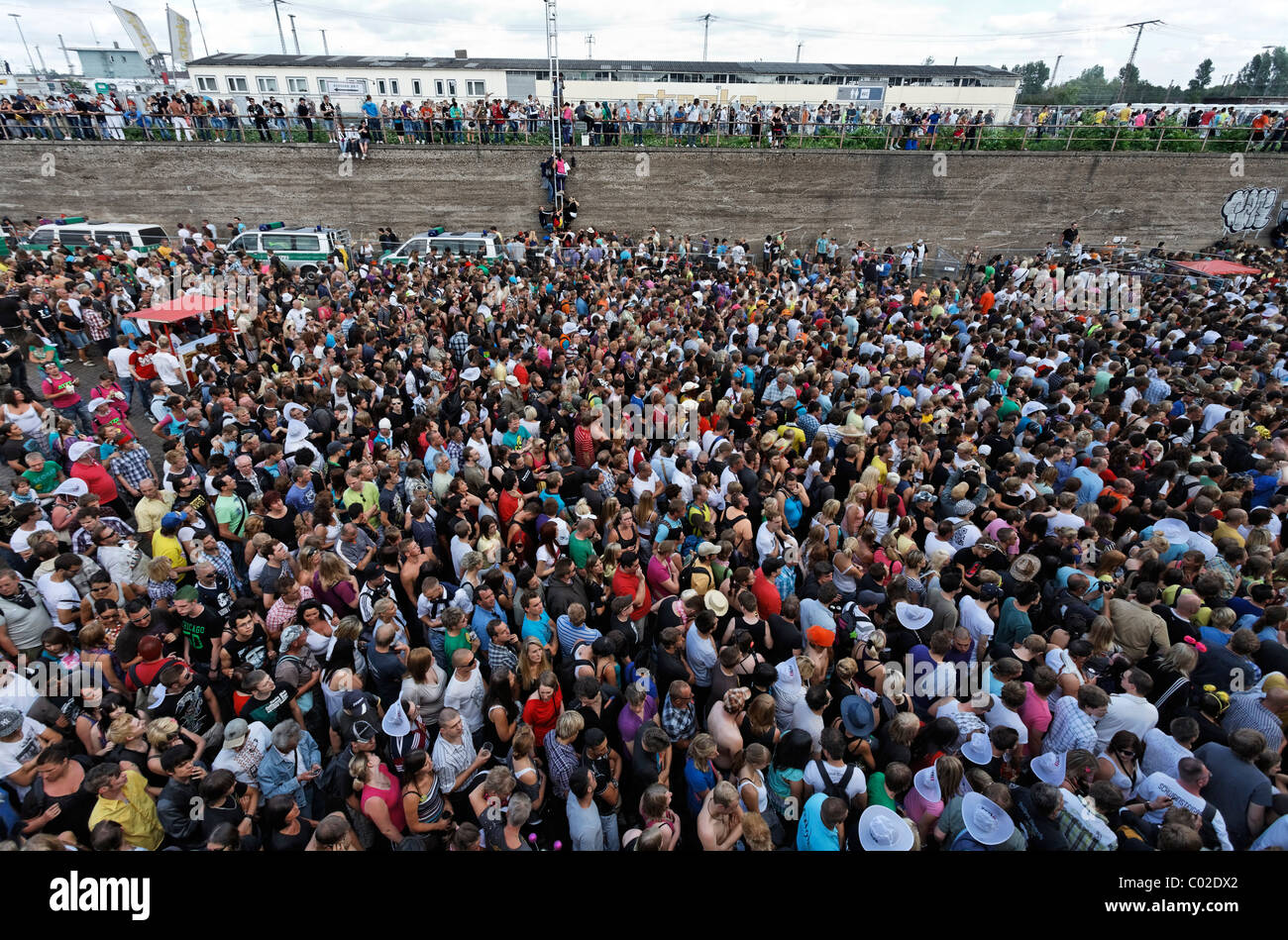 Young people pushing towards the exit causing a jam, mass panic leaving ...