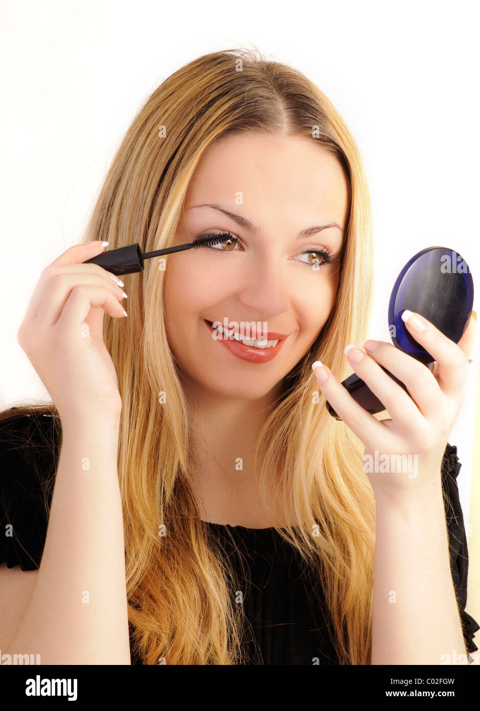 Applying mascara mouth hi-res stock photography and images - Alamy