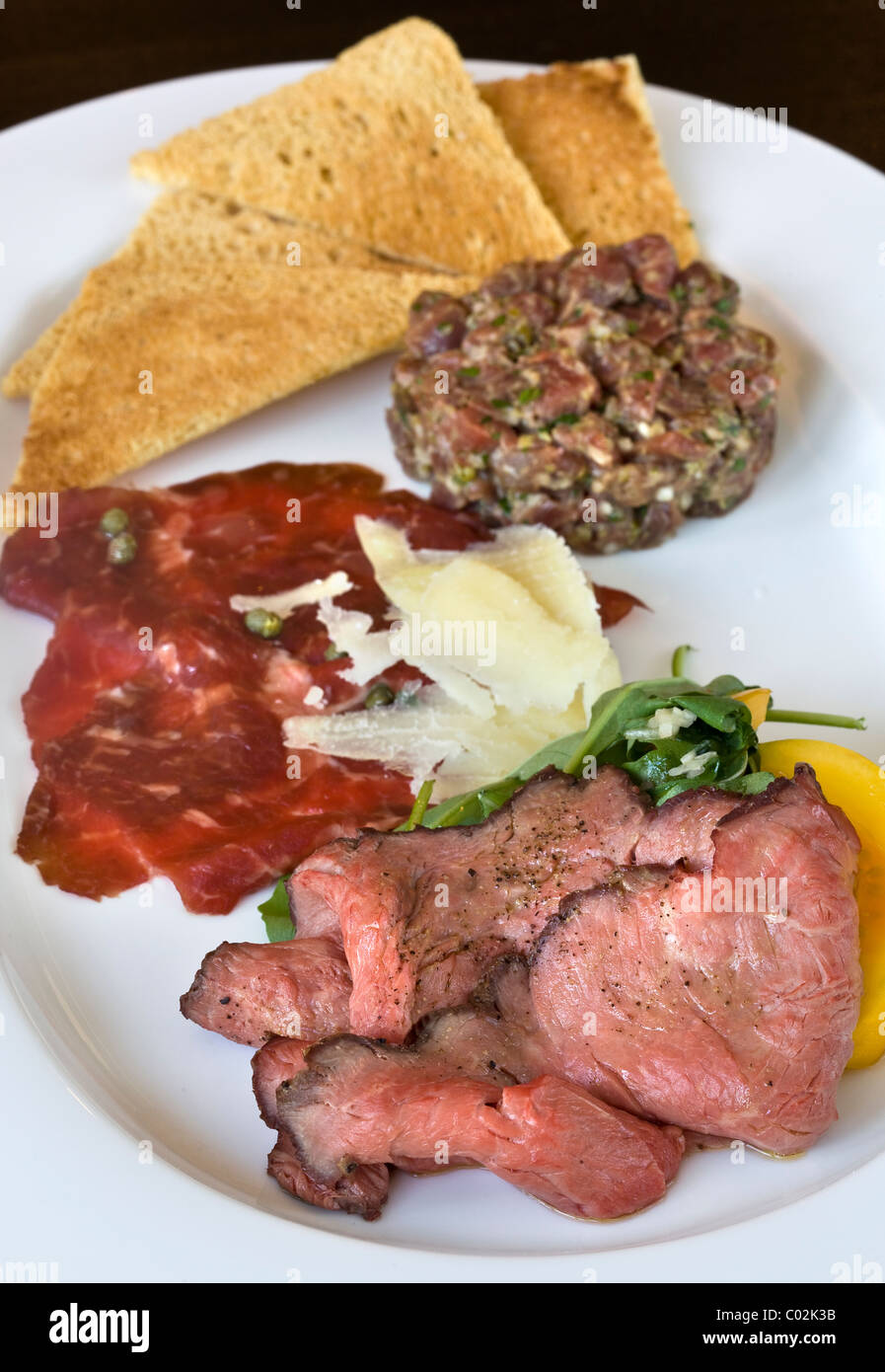 Plate of mixed cuts of beef Stock Photo - Alamy