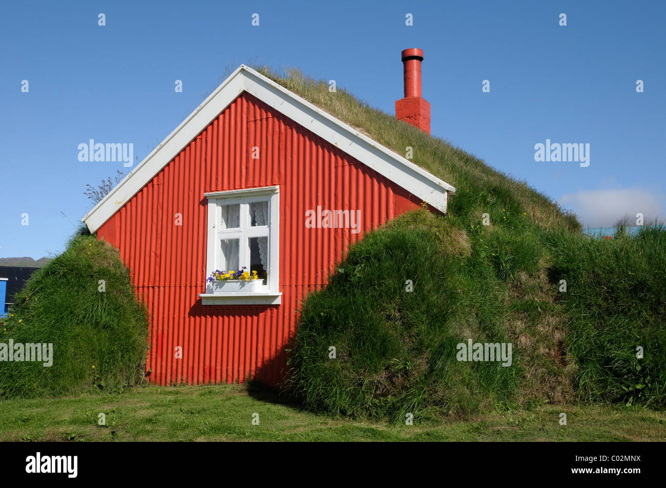Lindarbakki, a grass-covered house near the town of Bakkagerði, east ...