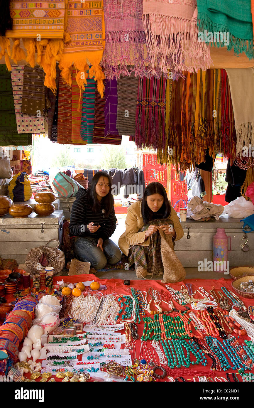Vendors selling typical fabrics and jewellery, market in the capital ...