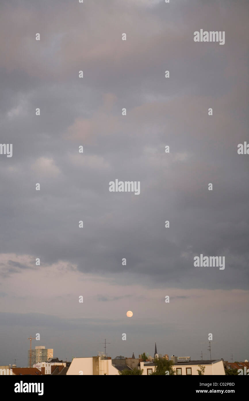 Moon over the rooftops of Hamburg, Germany, Europe Stock Photo - Alamy