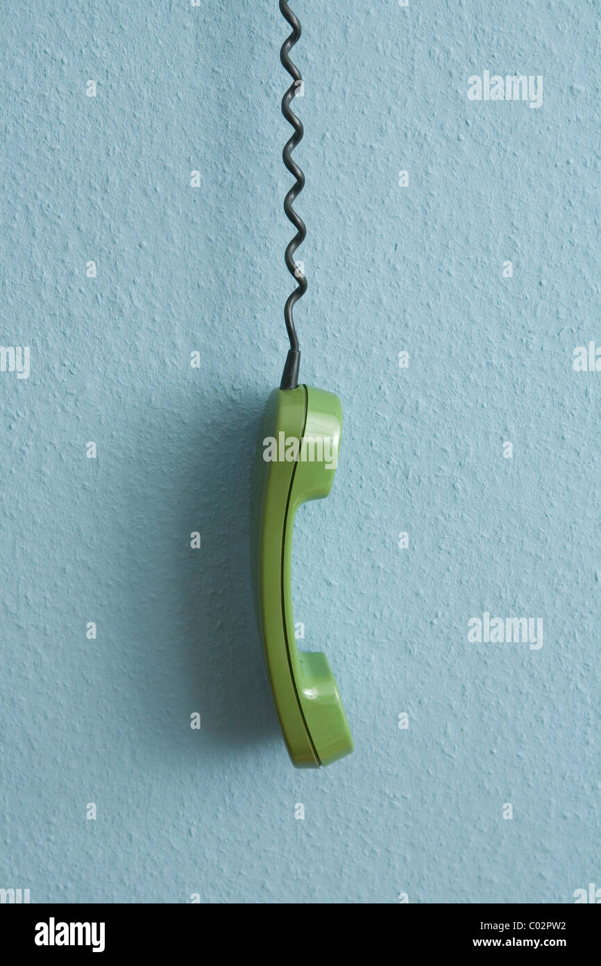 Hanging receiver, call Stock Photo - Alamy