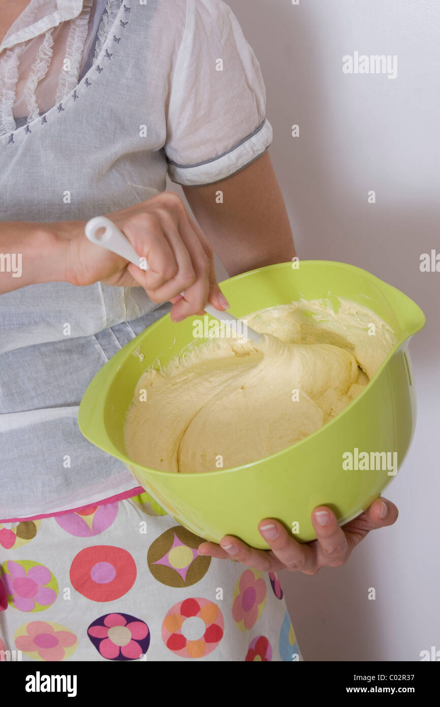 Woman stirring cake mix hi-res stock photography and images - Alamy