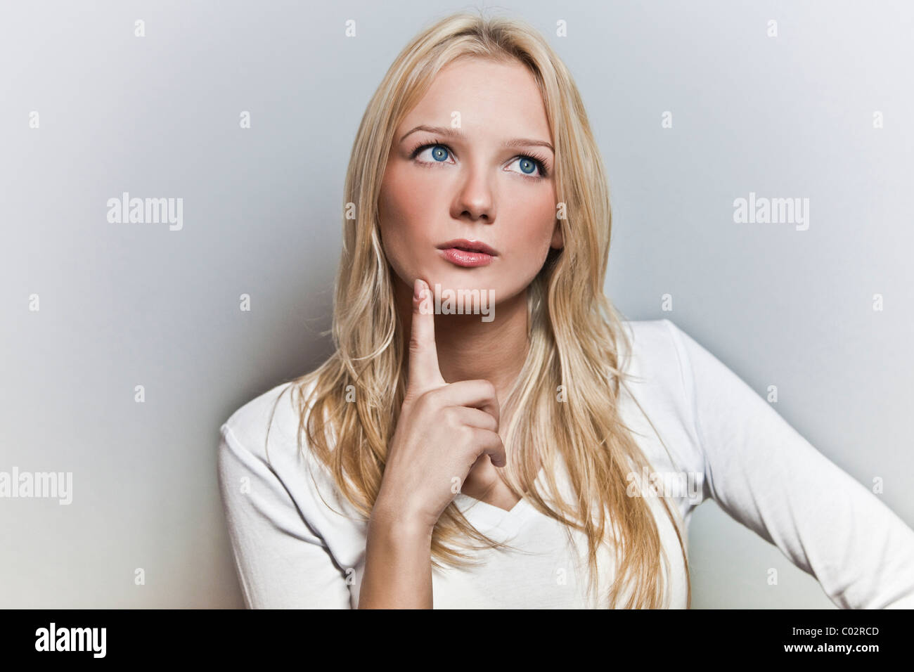 woman, questioning glance Stock Photo - Alamy