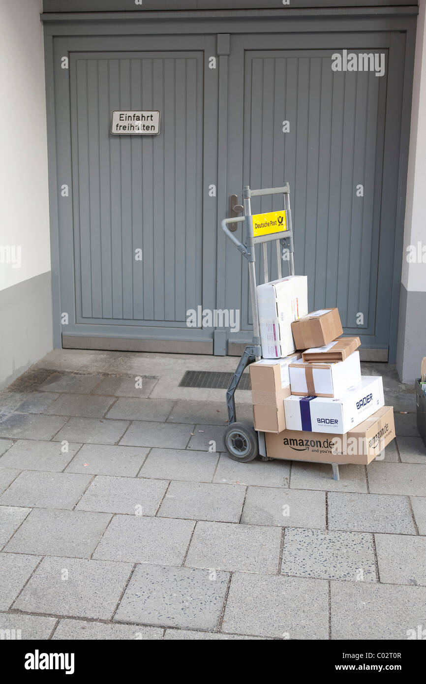 Sack barrow with packages Stock Photo - Alamy