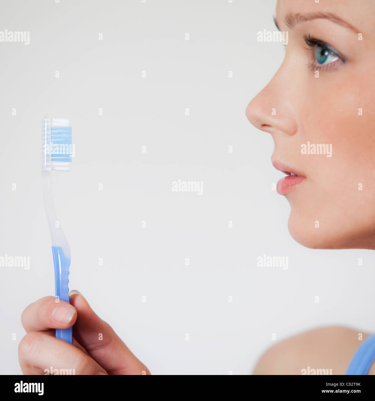 woman with a toothbrush Stock Photo - Alamy