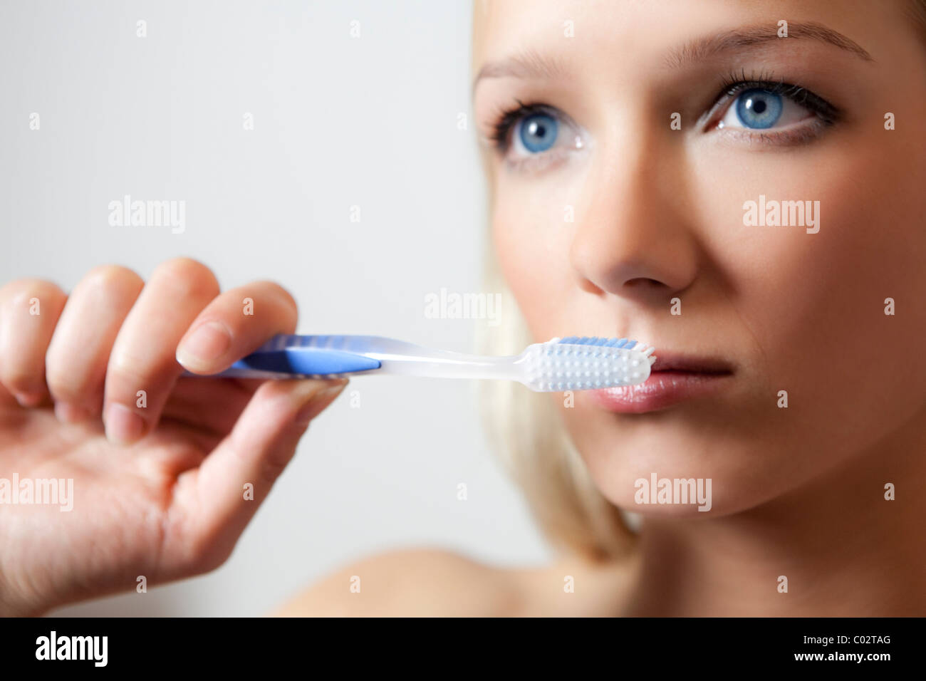 woman with a toothbrush Stock Photo - Alamy