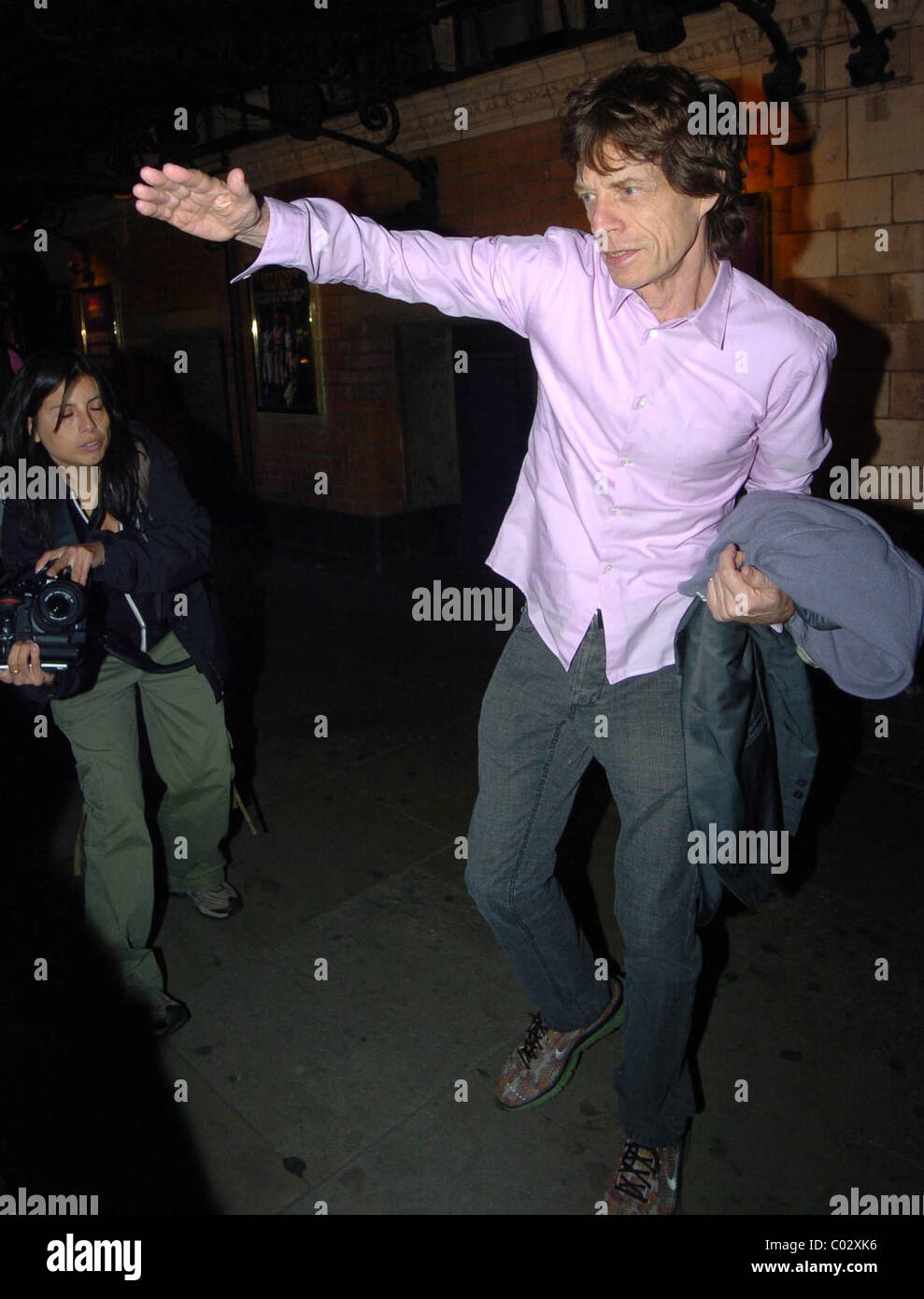 Mick Jagger leaving the Palace Theatre where 'Spamalot' was showing ...