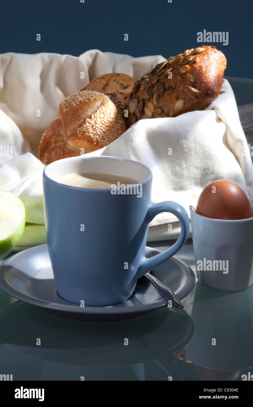 Set breakfast table with coffee, rolls, egg, cereal, apple Stock Photo ...