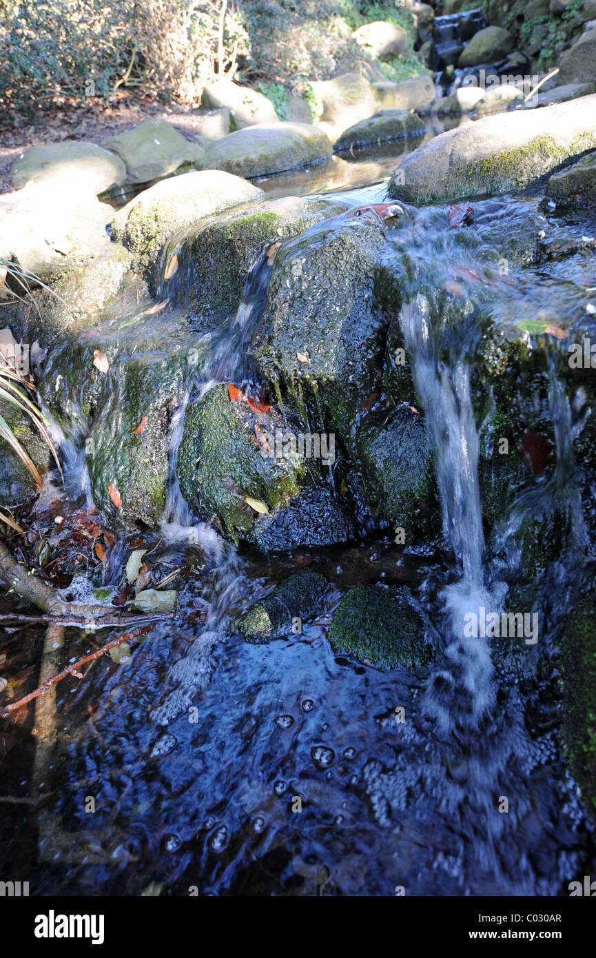 Running water down a small waterfall in Queens Park Brighton Stock ...