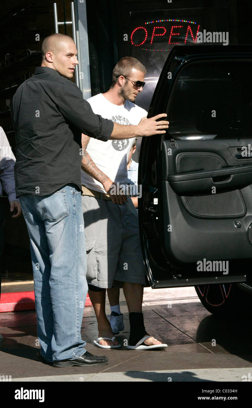 David Beckham and his son Brooklyn out shopping around Melrose. David ...