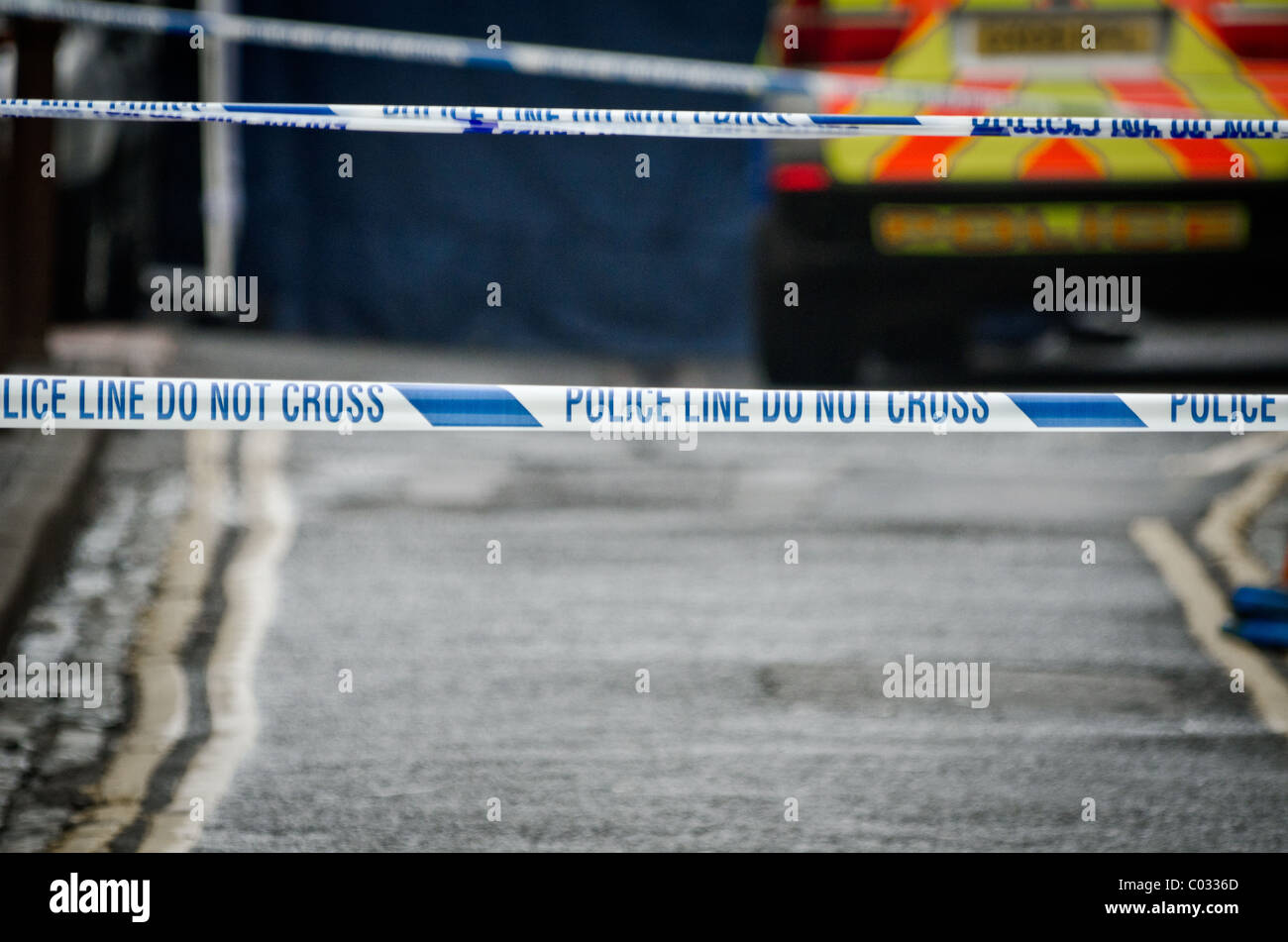 Police investigate the crime scene where police shot dead a suspect ...