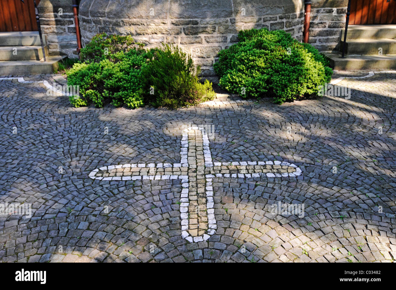 Cross symbol with paving stones hi-res stock photography and images - Alamy