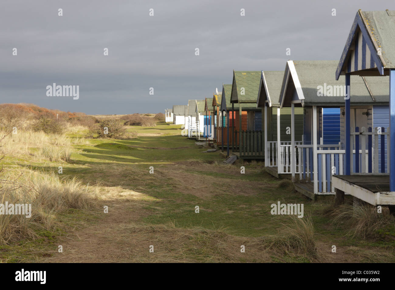 Beach huts behind the dunes at Old Hunstanton, North Norfolk Coast ...