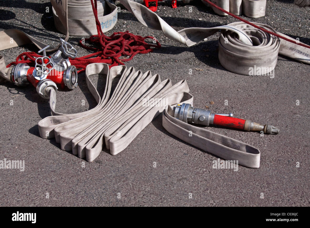 Fire hose hi-res stock photography and images - Alamy