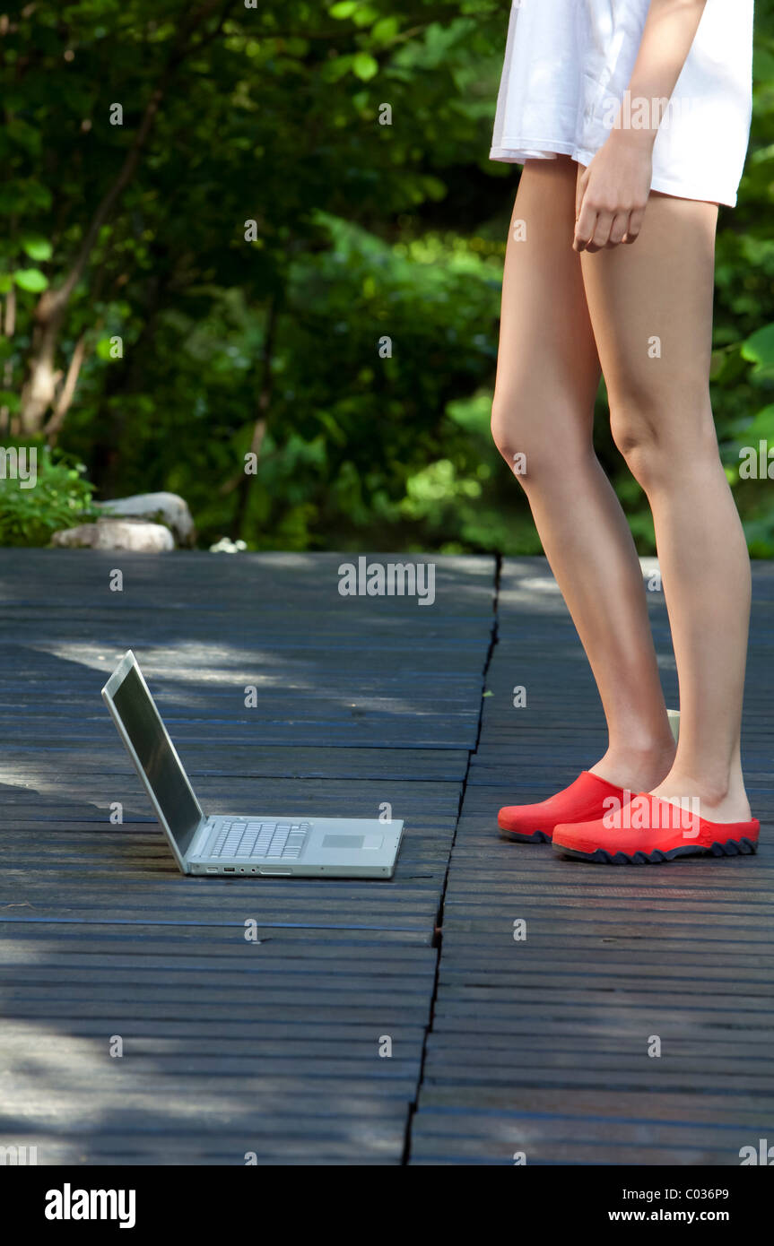 girl with a laptop, outdoor Stock Photo - Alamy