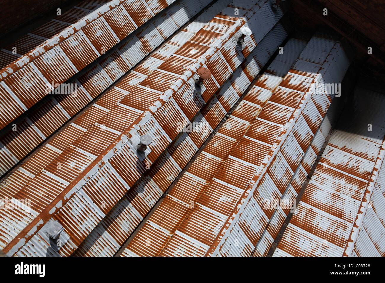 Corrugated tin factory roof Stock Photo - Alamy