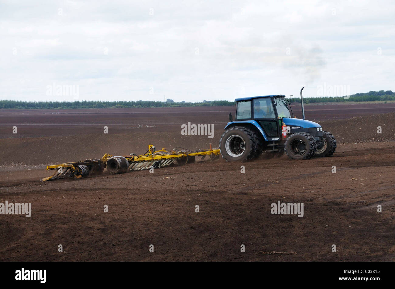 Peat machine used for the drying of black peat in preparation for the ...