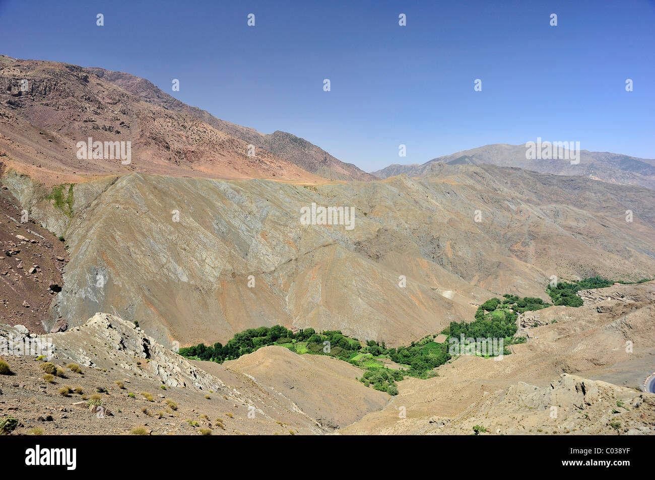 River valley with Berber settlement, small fields and trees, High Atlas ...