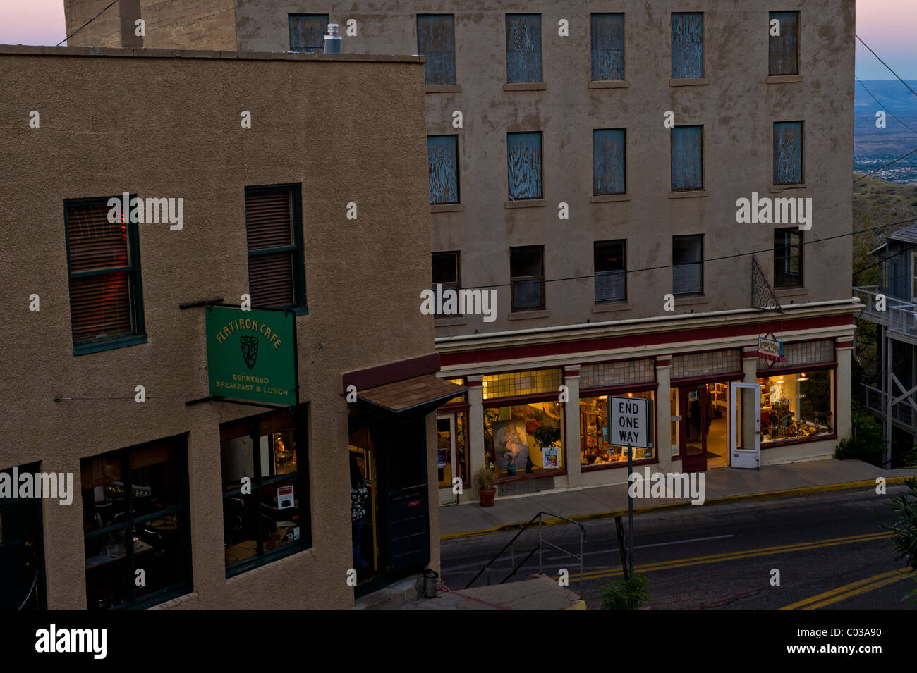 Down hill view of intersection and partly abandoned building Stock ...
