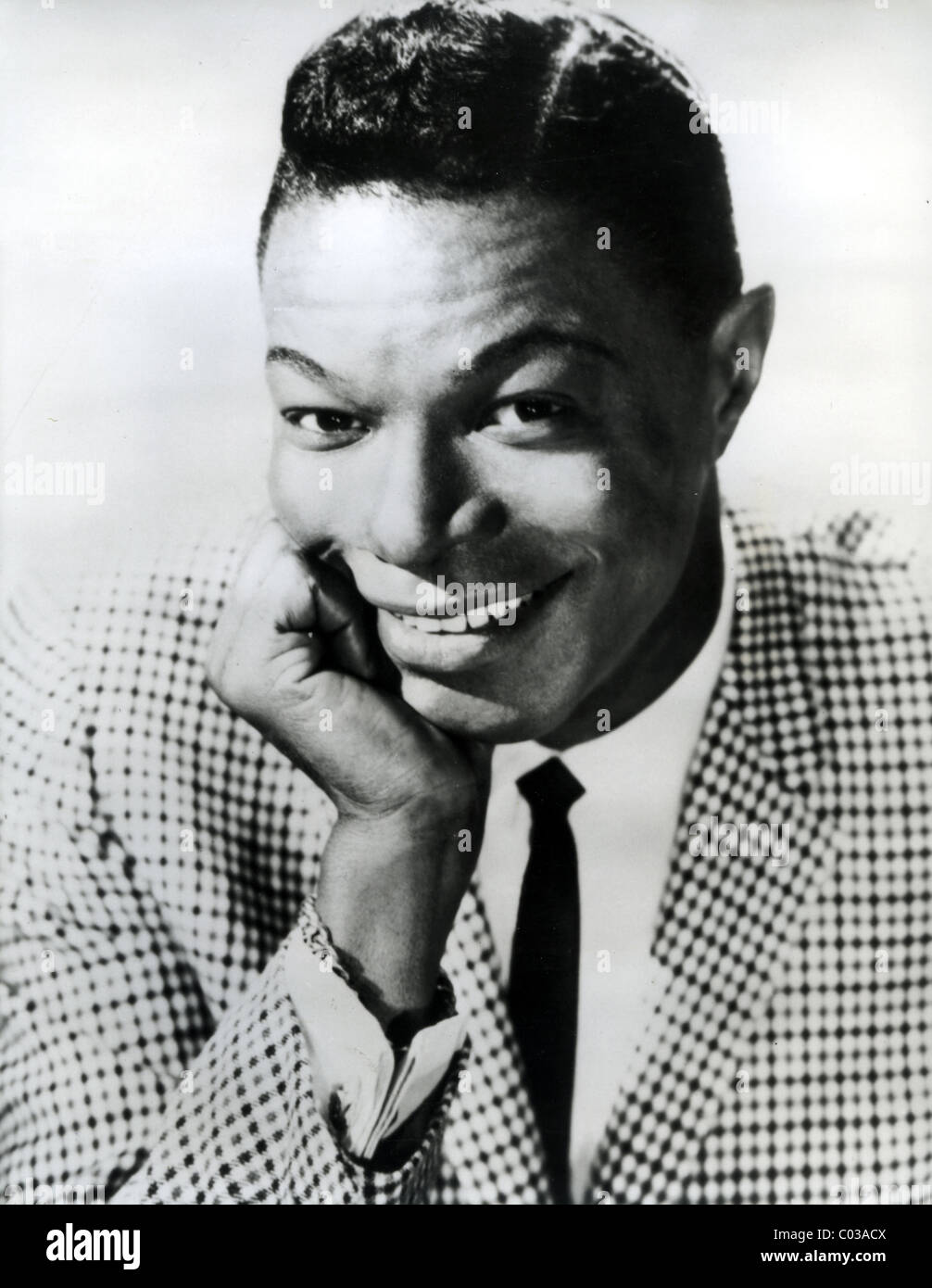 NAT KING COLE (1919-1965) US singer. musician and film actor Stock ...