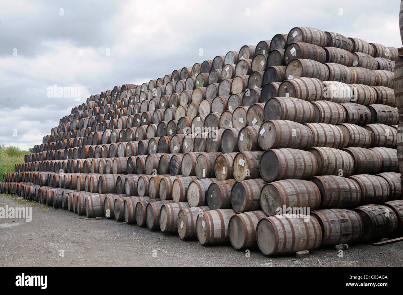 Stacked wooden whiskey barrels, oldest licensed whiskey distillery in ...