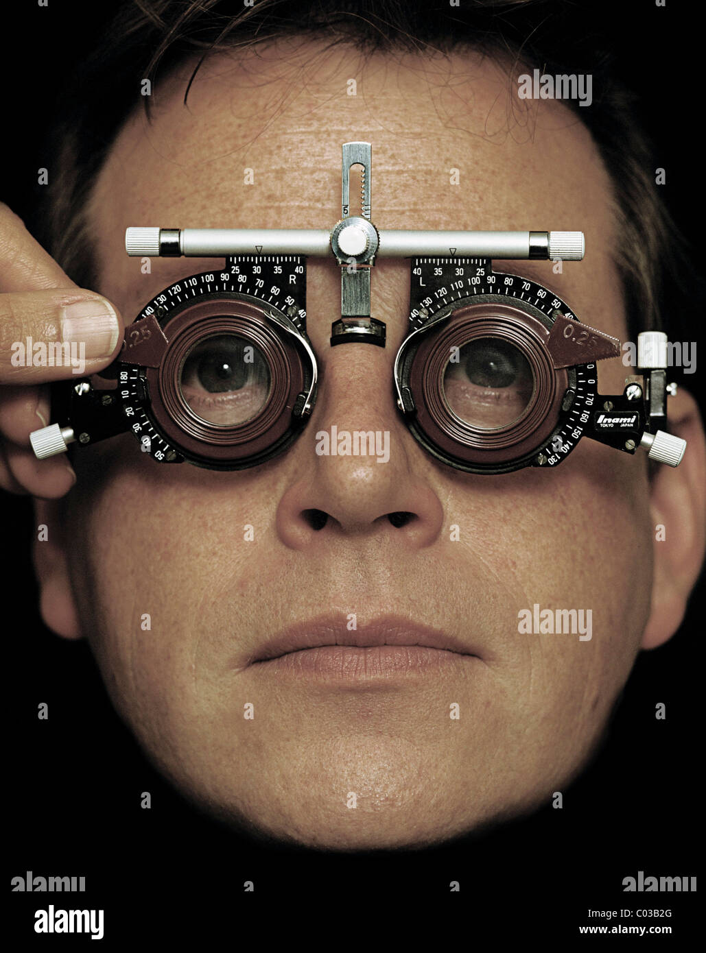 Male has an eye test Stock Photo - Alamy