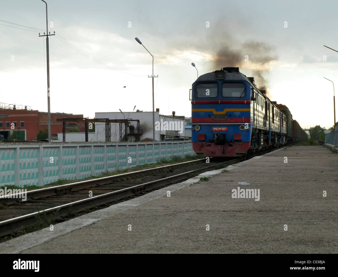 Diesel locomotive pulling a freight train of the Transmongolian Railway ...