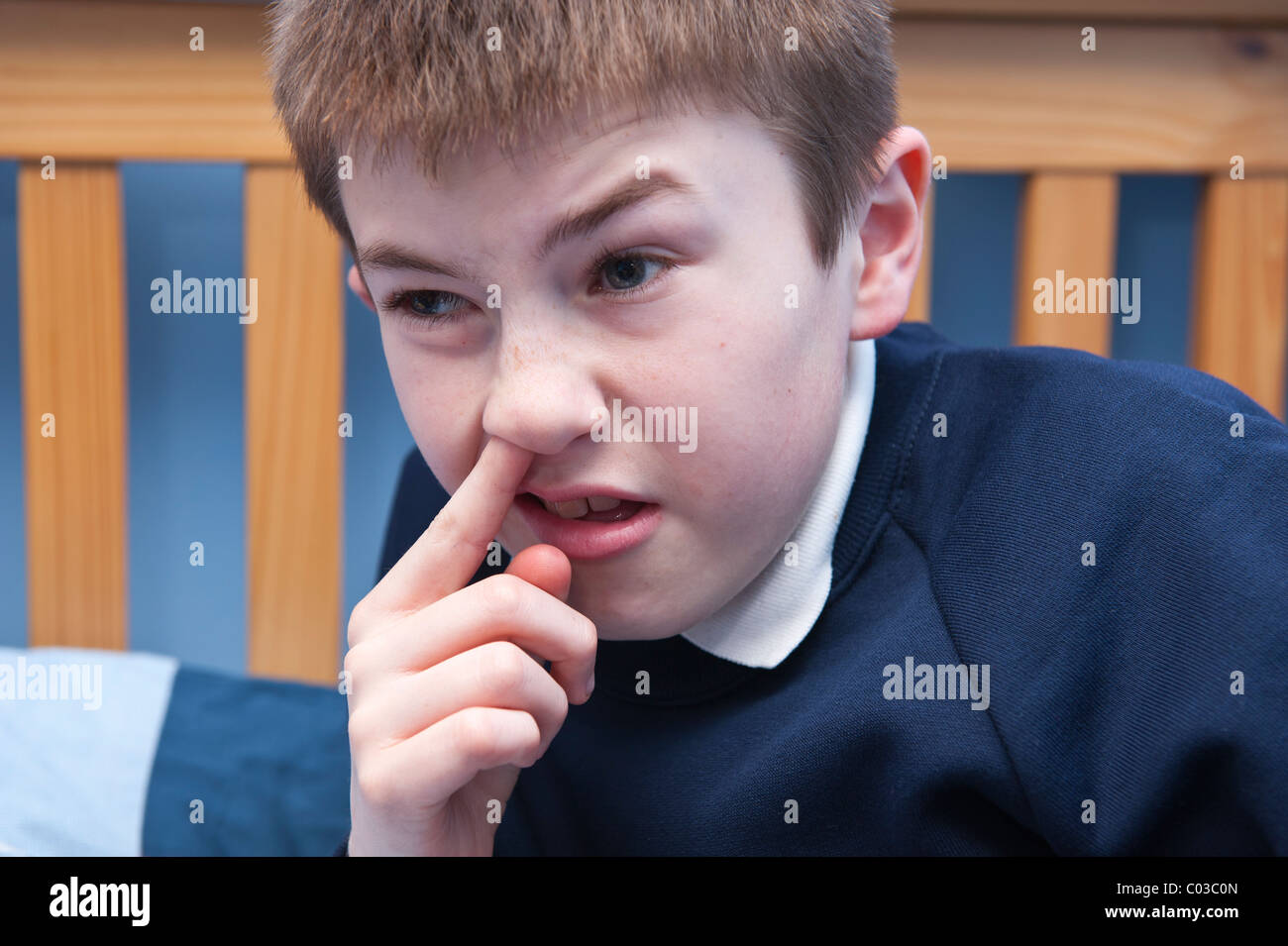 A Boy Child Picking His Nose In Bedroom Hi res Stock Photography And a-boy-child-picking-his-nose-in-bedroom-hi-res-stock-photography-and