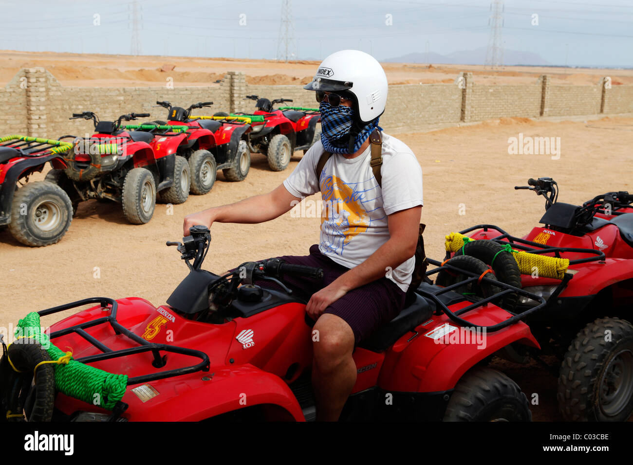 A man enjoys quad biking at Sharm el Sheikh in Egypt Stock Photo - Alamy