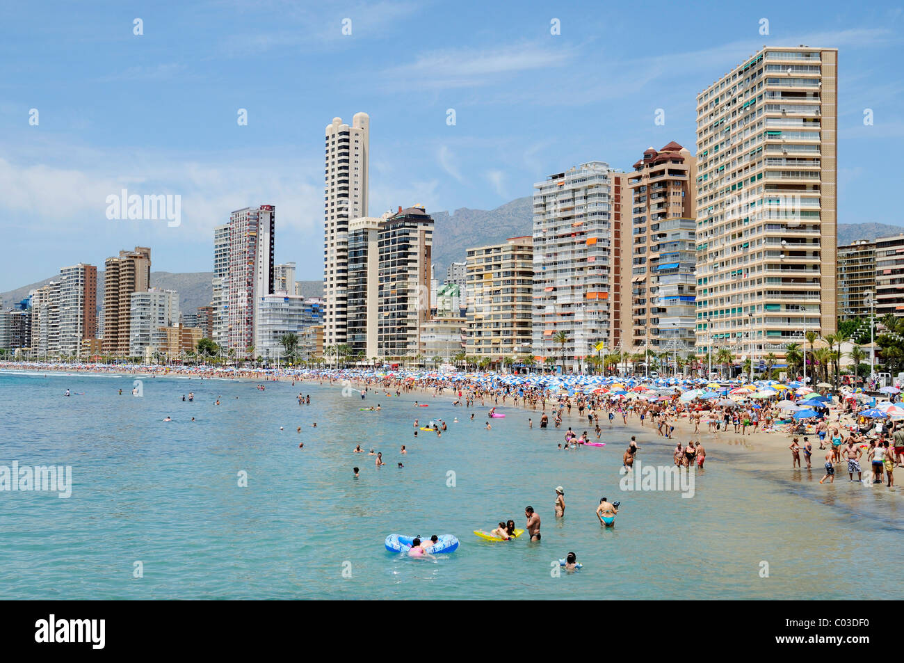 Holidaymakers, skyscrapers, Playa de Levante beach, Benidorm, Costa ...