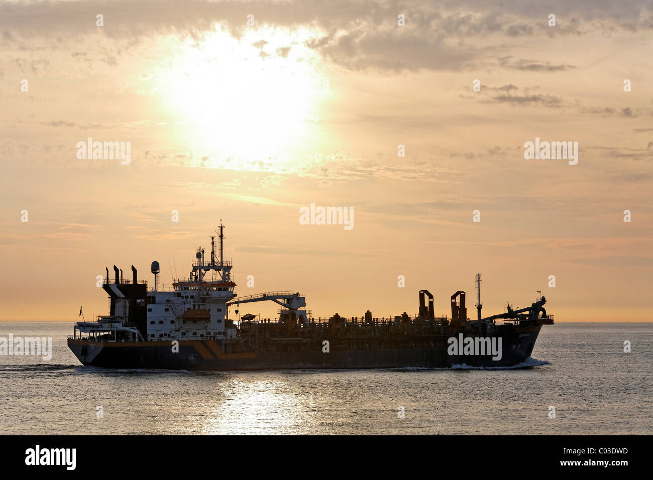 Cargo boat on the sea, sunset, Zoutelande, Walcheren peninsula, Zeeland ...