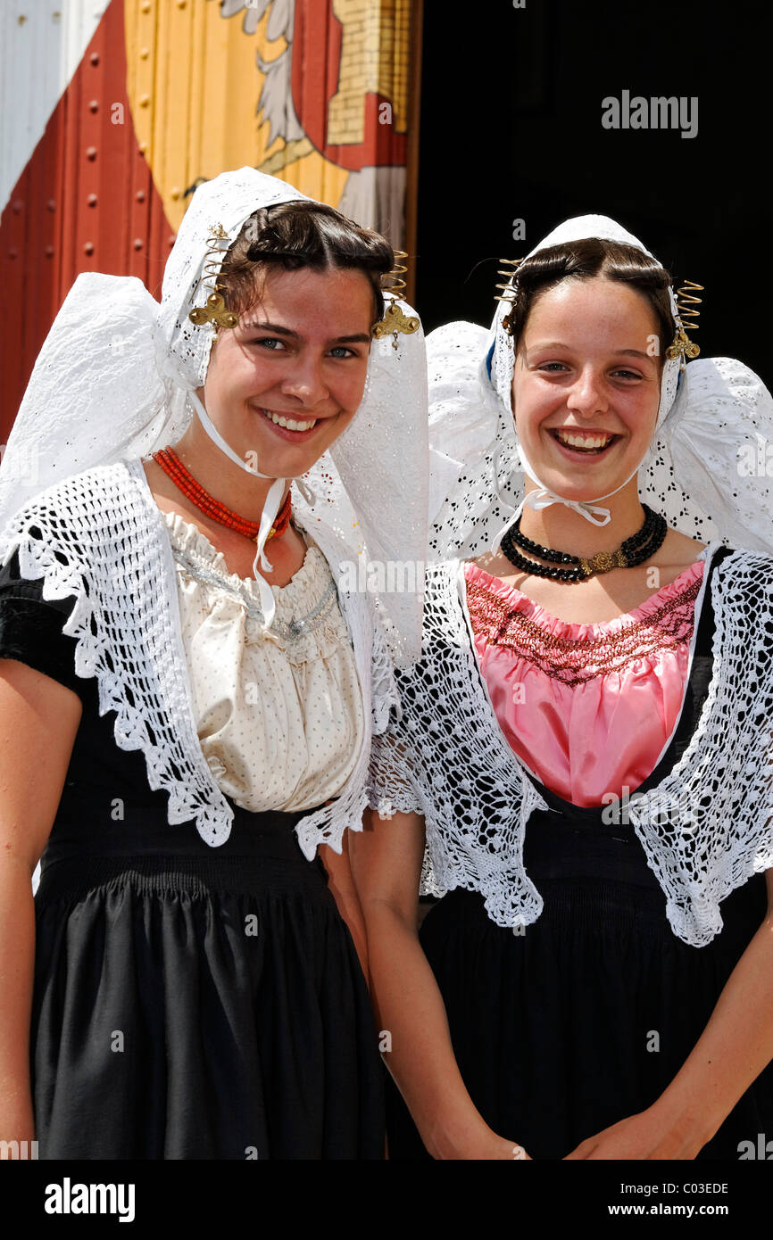 Two Young Girls Wearing Traditional Costumes Of The Zeeland Province